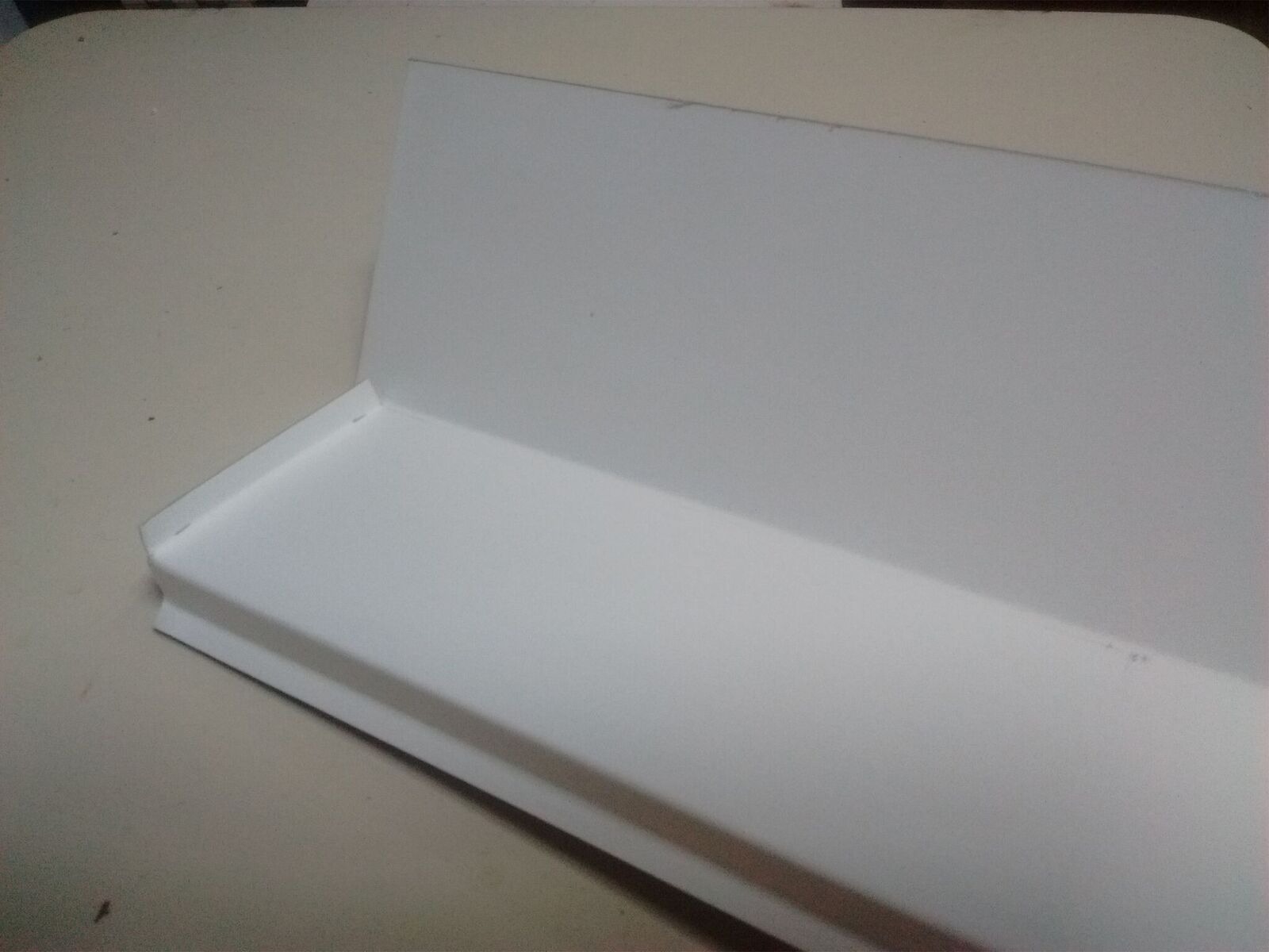 How to Install a Better Window Head Trim and Drip Cap - Fine Homebuilding