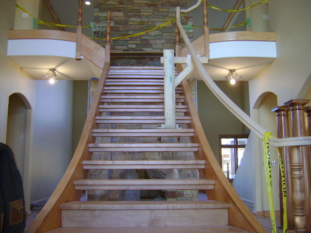 Maple flared stairway - Fine Homebuilding