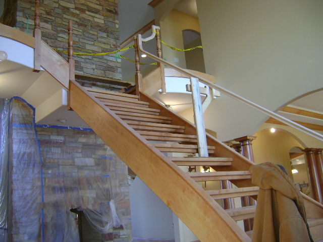 Maple flared stairway - Fine Homebuilding