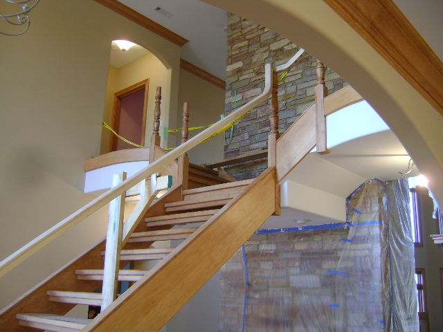 Maple flared stairway - Fine Homebuilding