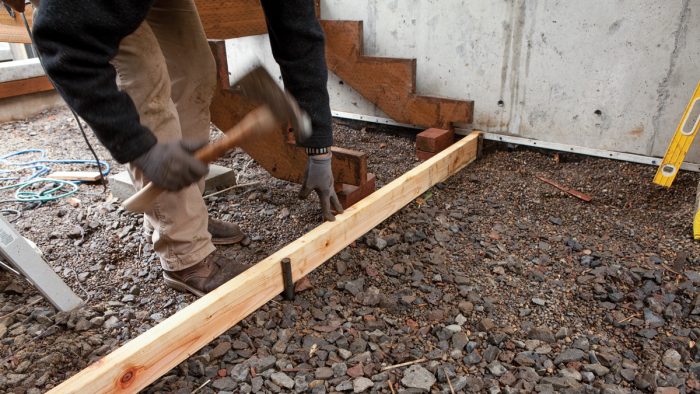 How to Install a Grade Beam for Deck Stairs - Fine Homebuilding